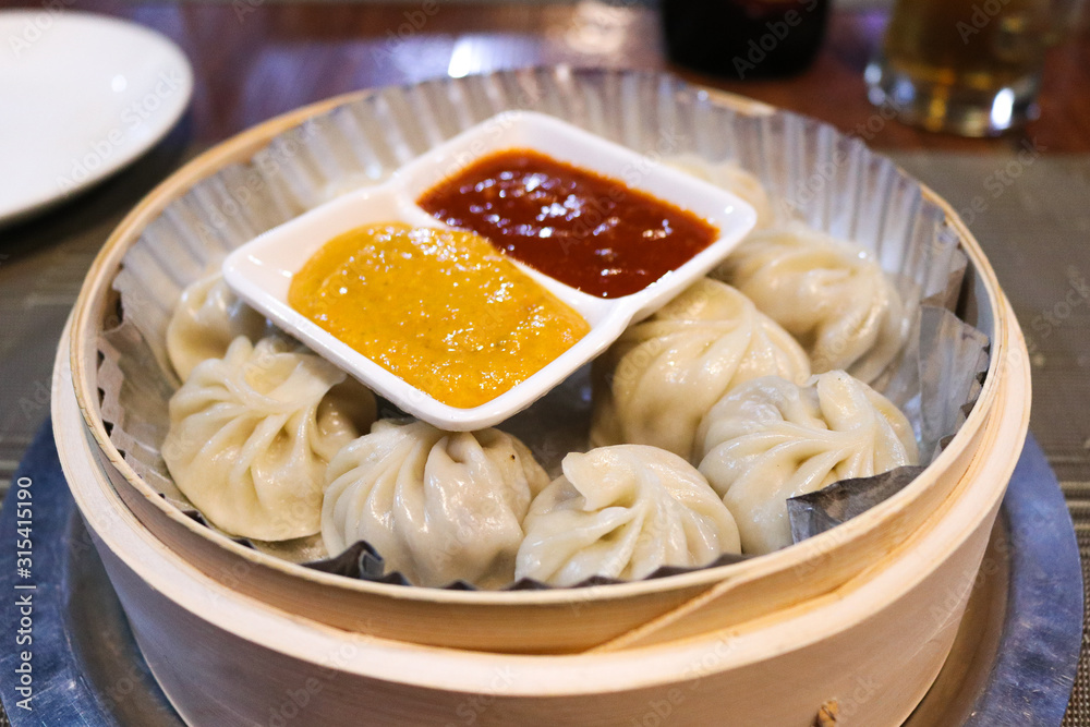 Momo, Steamed Dumpling with spice, Traditional Nepali Food Stock Photo ...