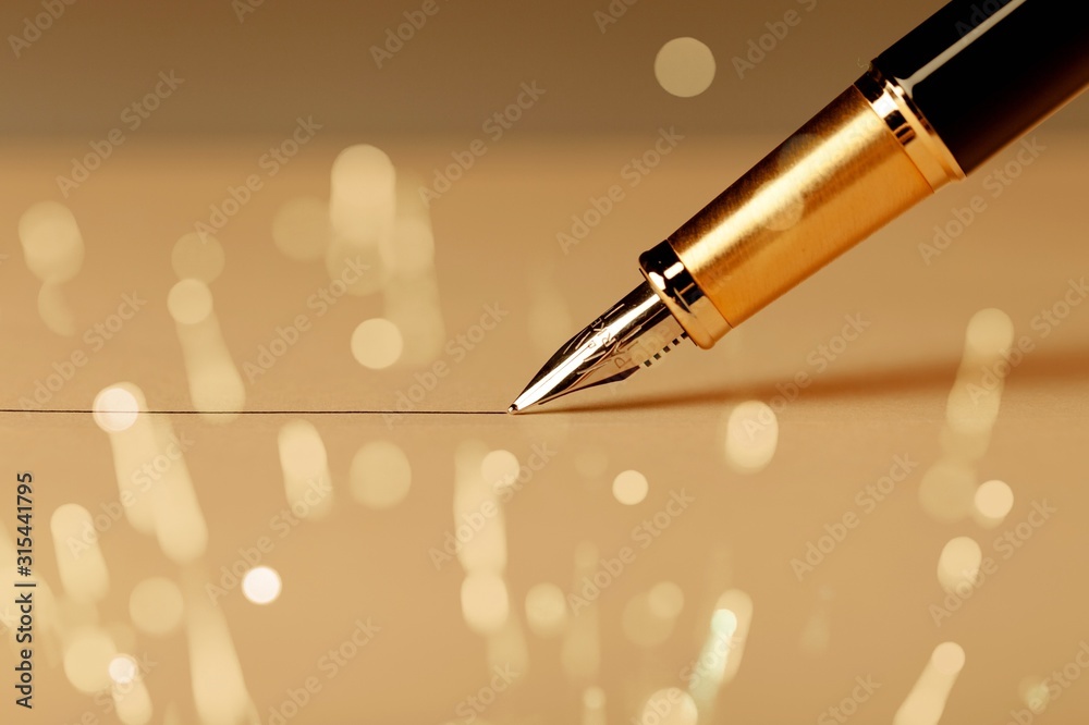 Signing a signature with a fountain pen Stock Photo | Adobe Stock