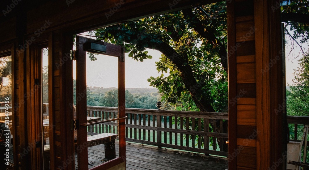 landscape out of window view on porch in woodland Stock Photo | Adobe Stock
