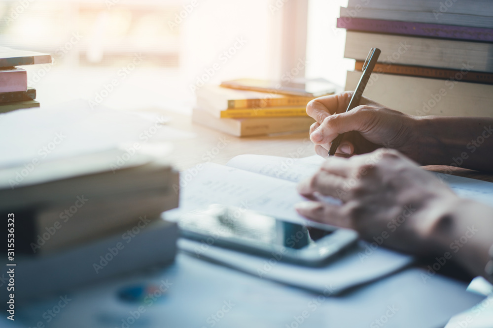 high school,university student study.hands holding pencil writing paper ...