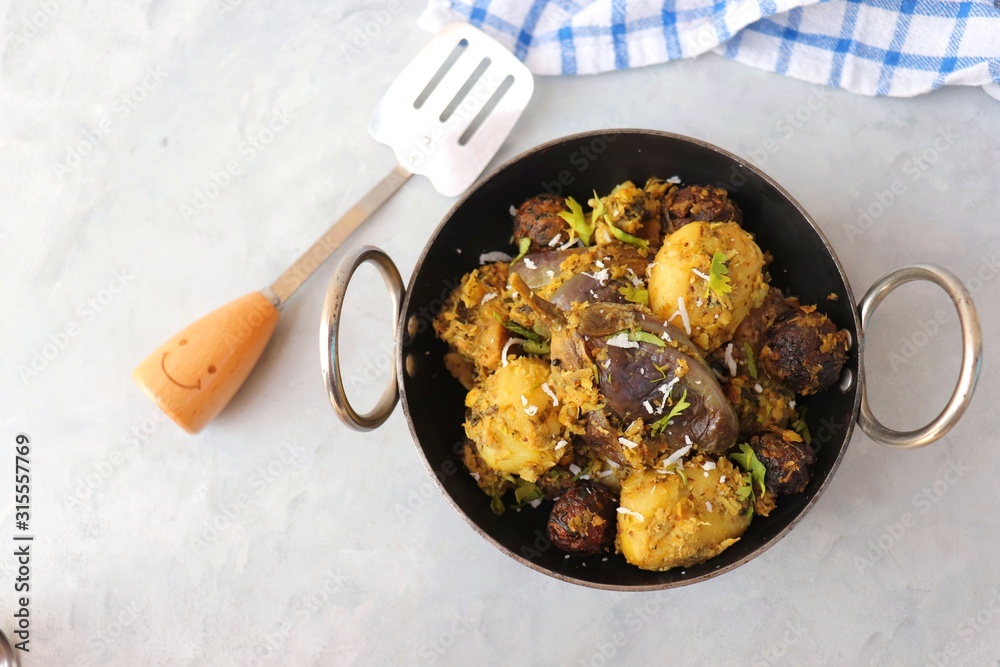 Food - Traditional Indian Gujarati dish Surti Undhiyu. Its a mixed ...