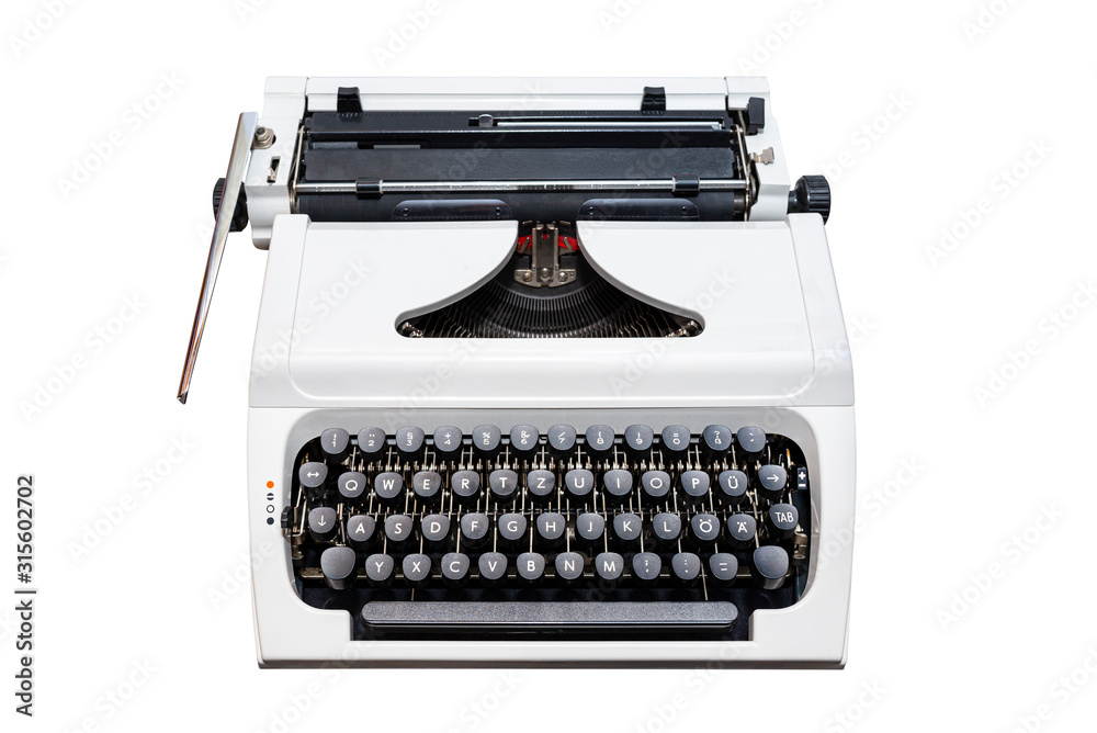 Classic, manual typewriter in white with a German keyboard layout ...