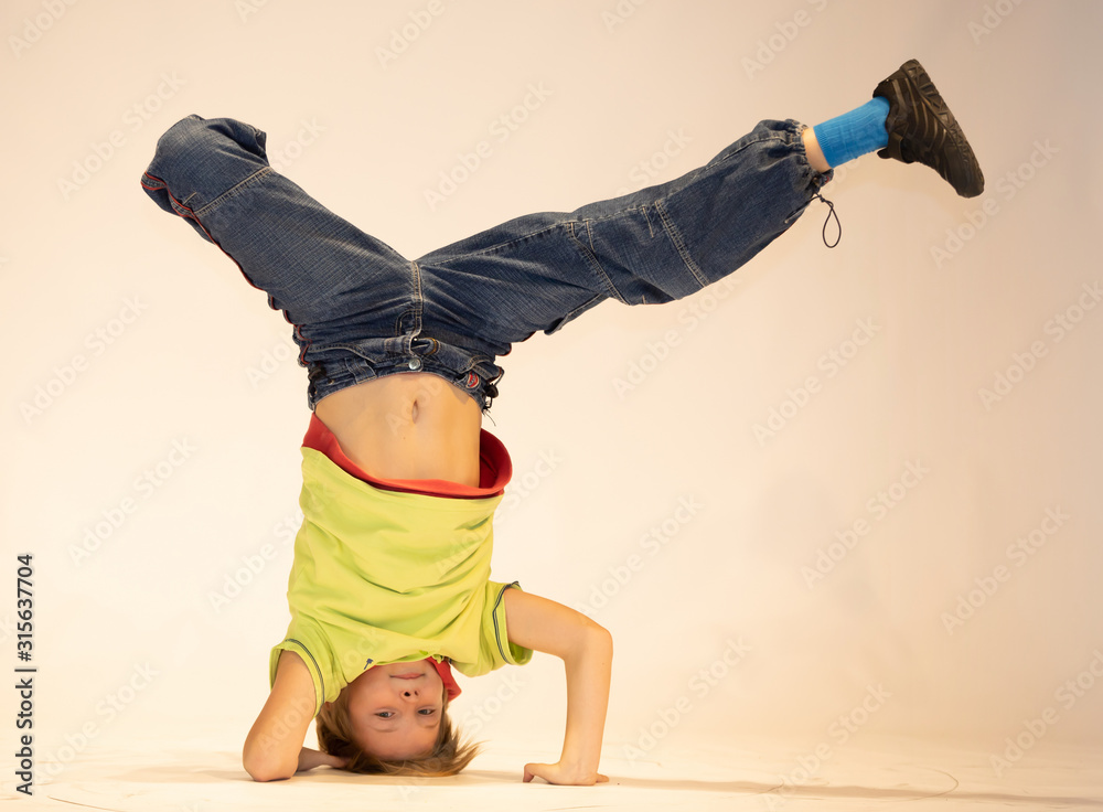 little boy in a dance position, boy dancing breakdance, unique position ...
