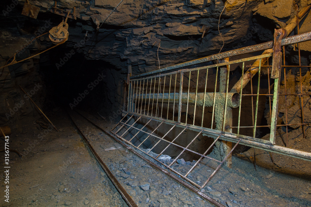 Underground gold mine shaft tunnel ore and waste passes Stock Photo ...