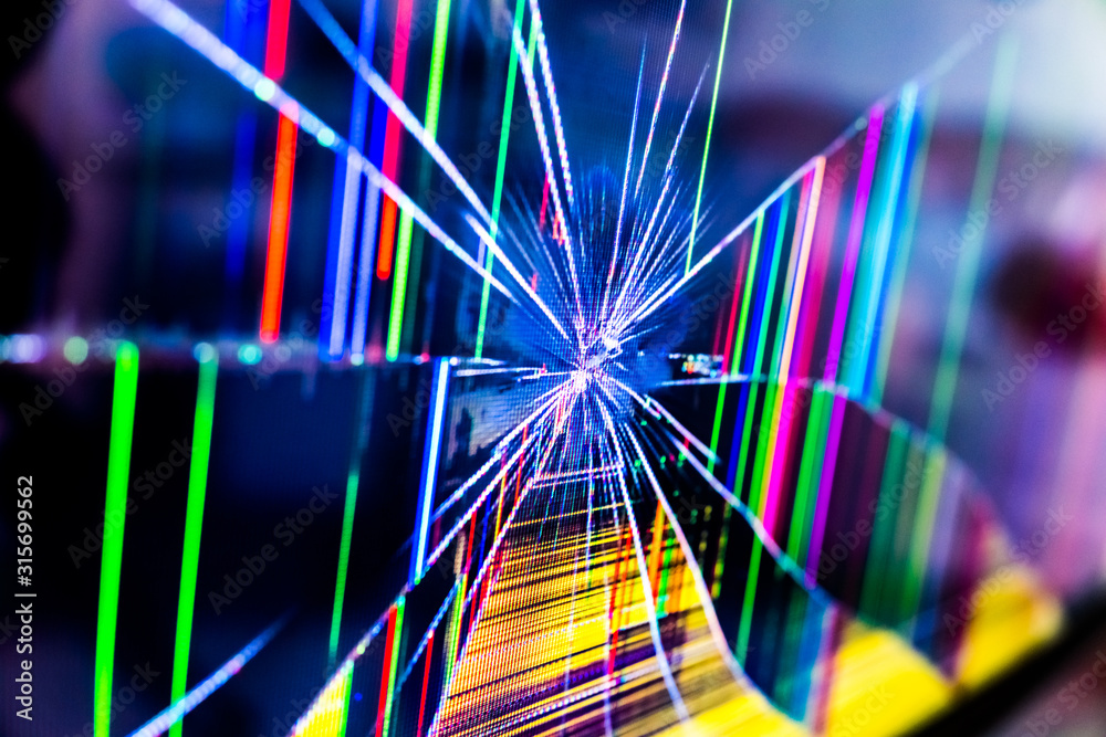 Broken led screen hit by a hammer, with many background colors while it ...