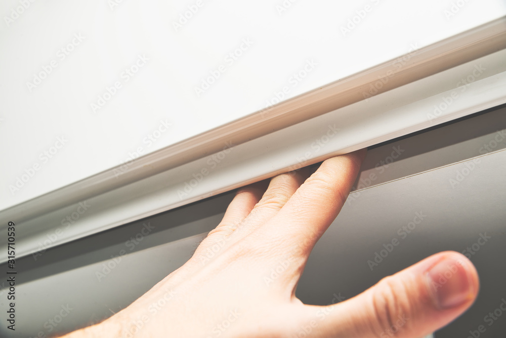 Pinching fingers at the door. Finger injury concept. Lack of attention ...