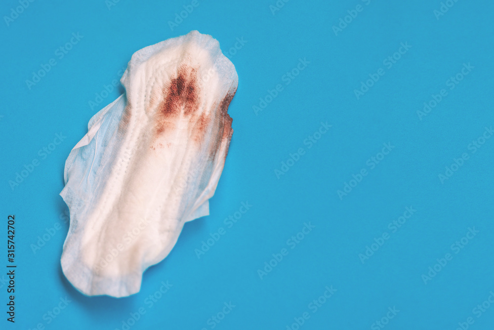 Used sanitary pad with natural blood. Woman on critical days ...
