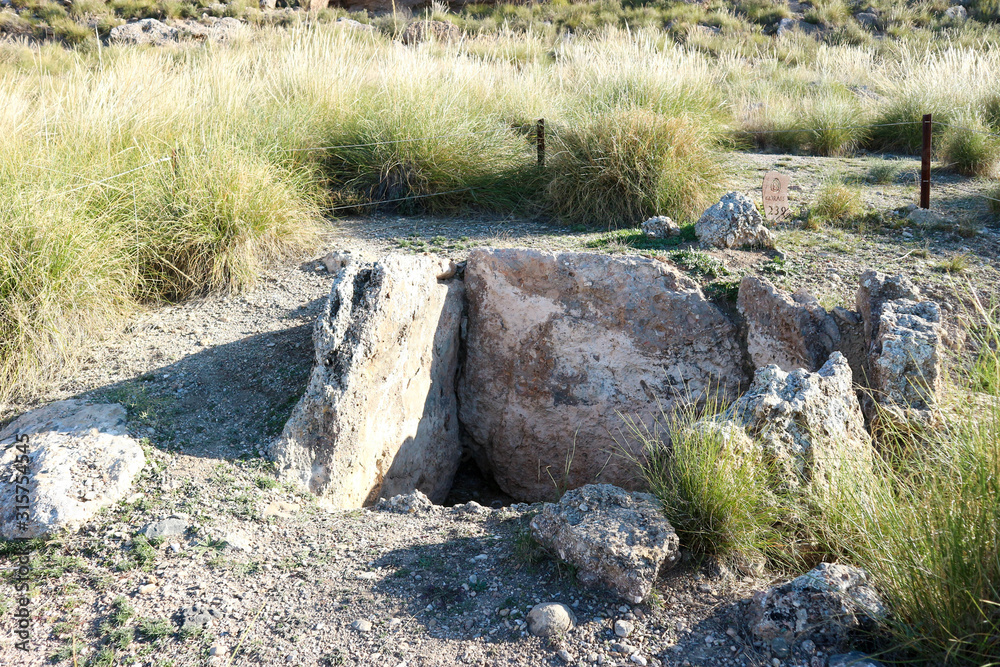 Stones of ancient megalithic burial construction dolmen in Gorafe ...