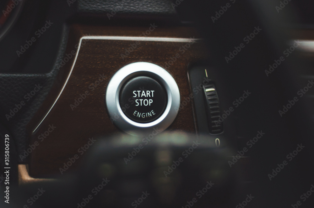 Starting the car engine using a special start / stop button built into ...