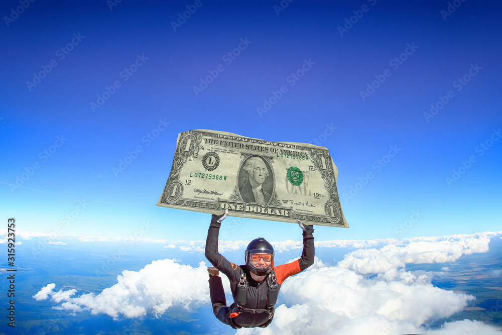 1 dollar. Parachutist is flying a flag of dollar bill. National ...