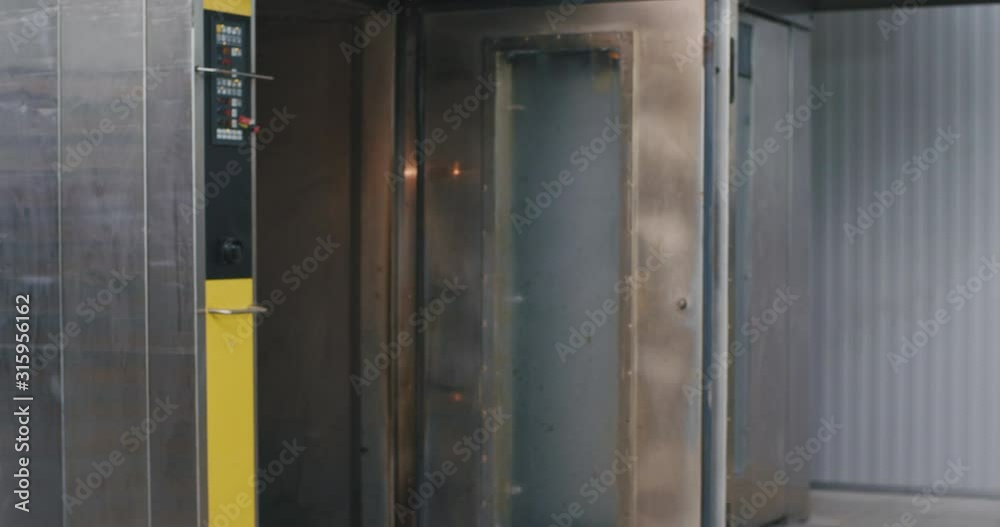 Process of loading the baking bread into the industrial oven , bakery ...