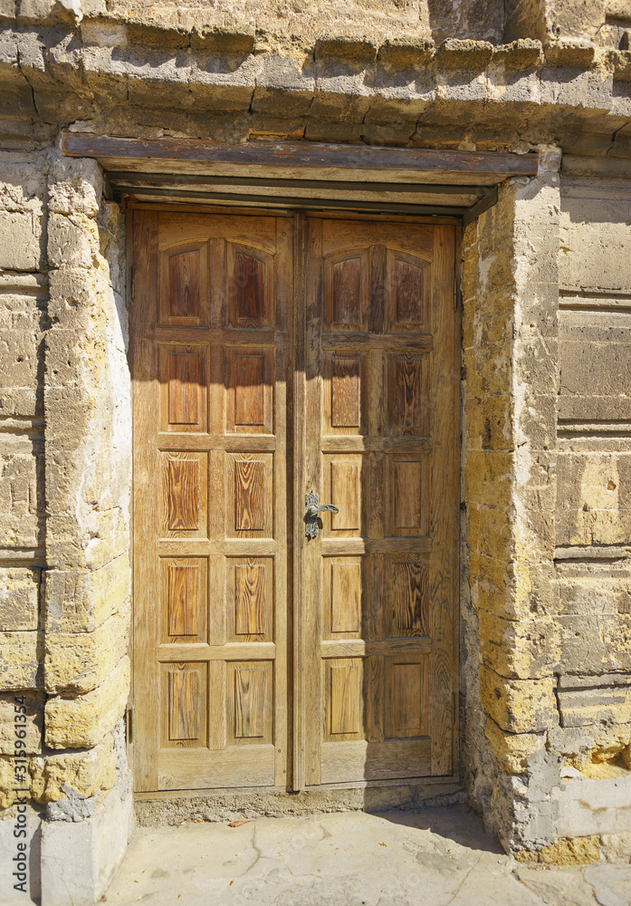Entrance wooden door of the old synagogue egiya-Kapay in Evpatoria ...