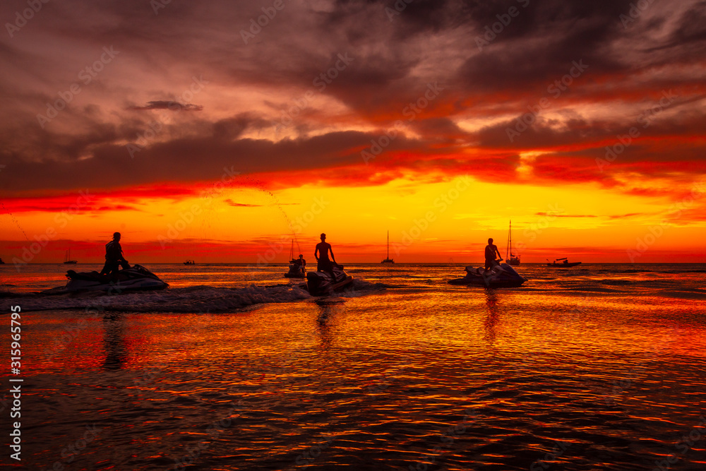 Roatan, Honduras »; January 2020: A group of young people on a jet ski ...