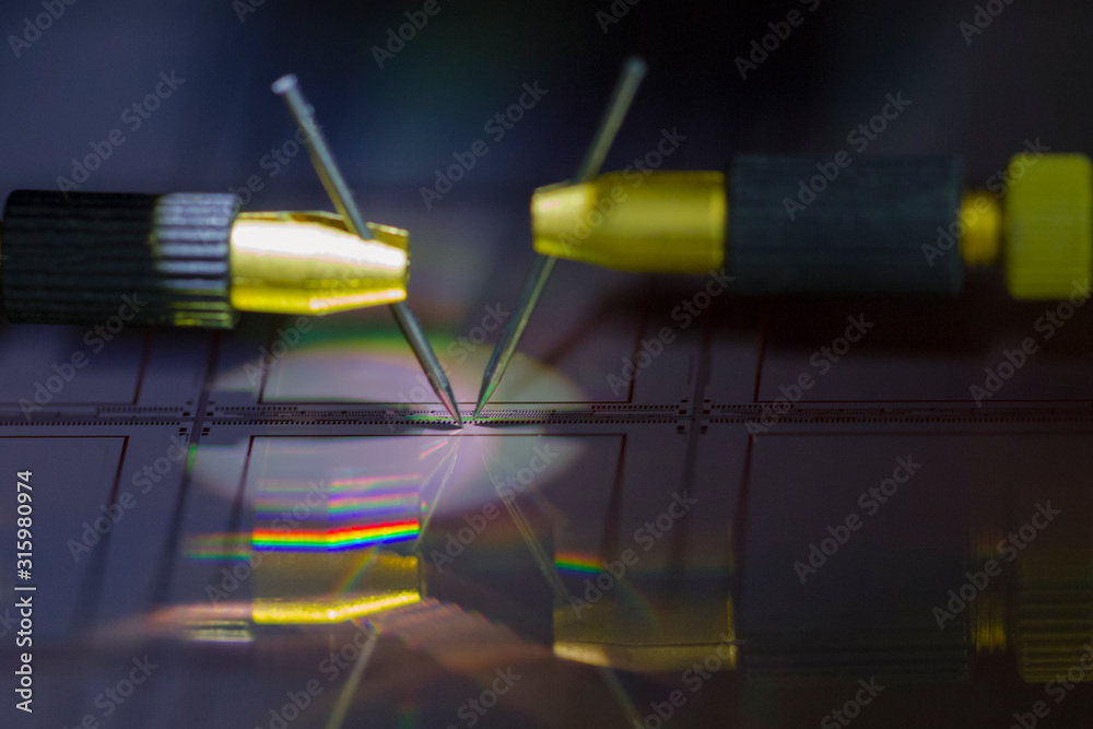 Manual probe system with needles for test of semiconductor on silicon ...