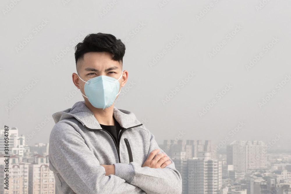 asian man wears protective mask Stock Photo | Adobe Stock