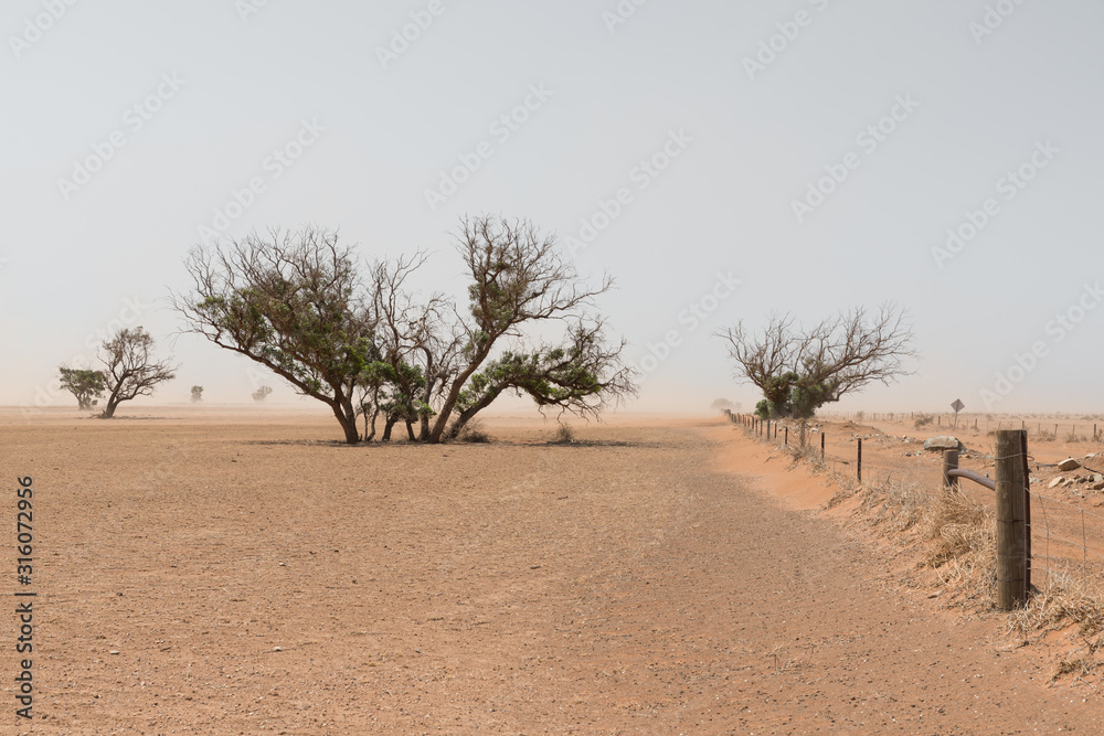 Sand storm in remote Australian agricultural farm field. Climate change ...