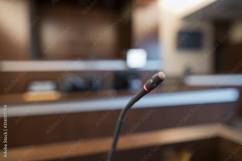 Podium microphone in empty courtroom Stock Photo | Adobe Stock