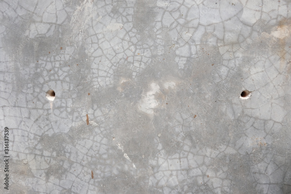 Cracks holes on the gray cement concrete wall Caused by drilling, crack ...