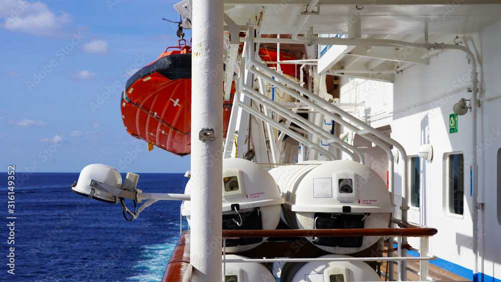 walk deck on a cruise ship. safety on the ship, lifeboat, liferafts ...