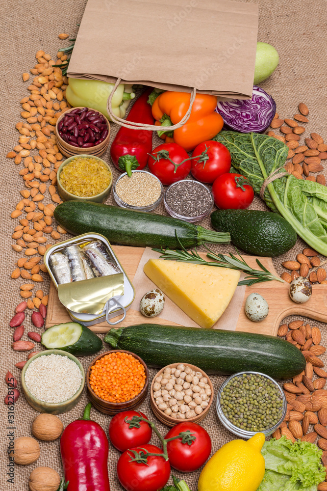 Healthy lifestyle concept. Set of healthy food: cheese sardines, leavy ...