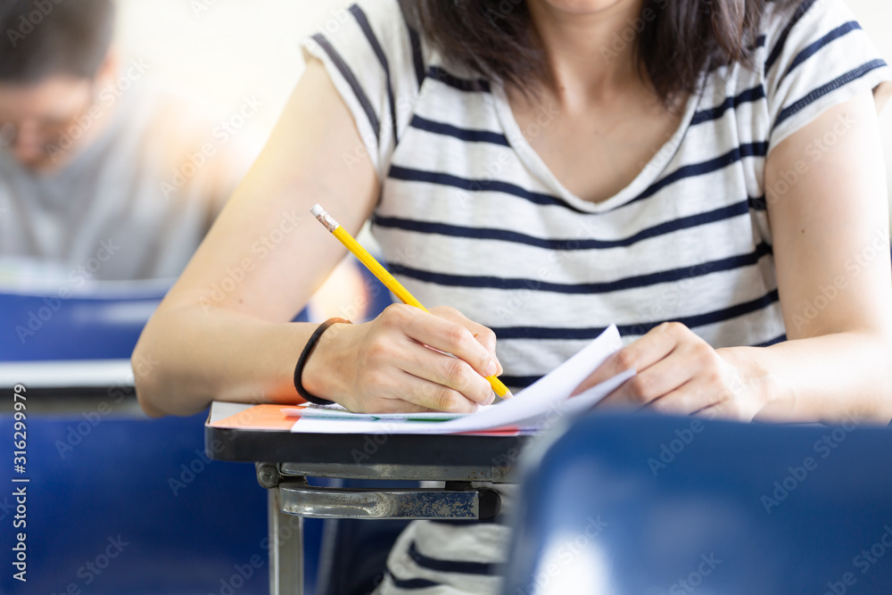 high school,university student study.hands holding pencil writing paper ...