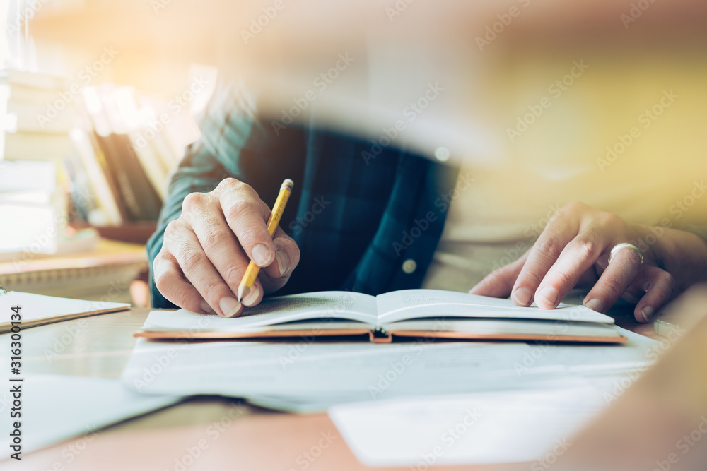 high school,university student study.hands holding pencil writing paper ...