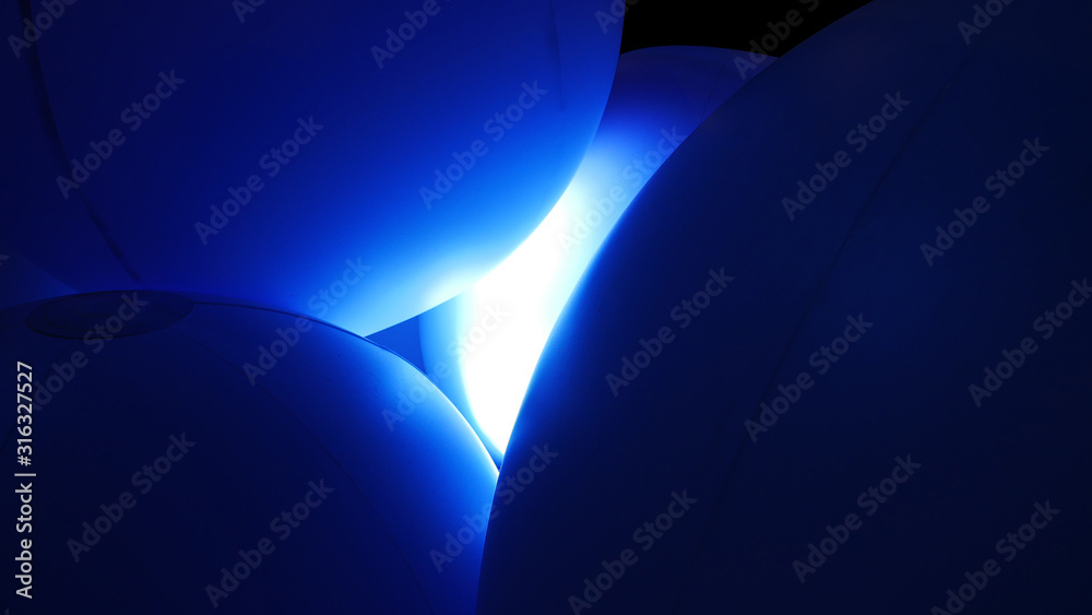 White big balloons, balls and blue light flare color in middle circle ...