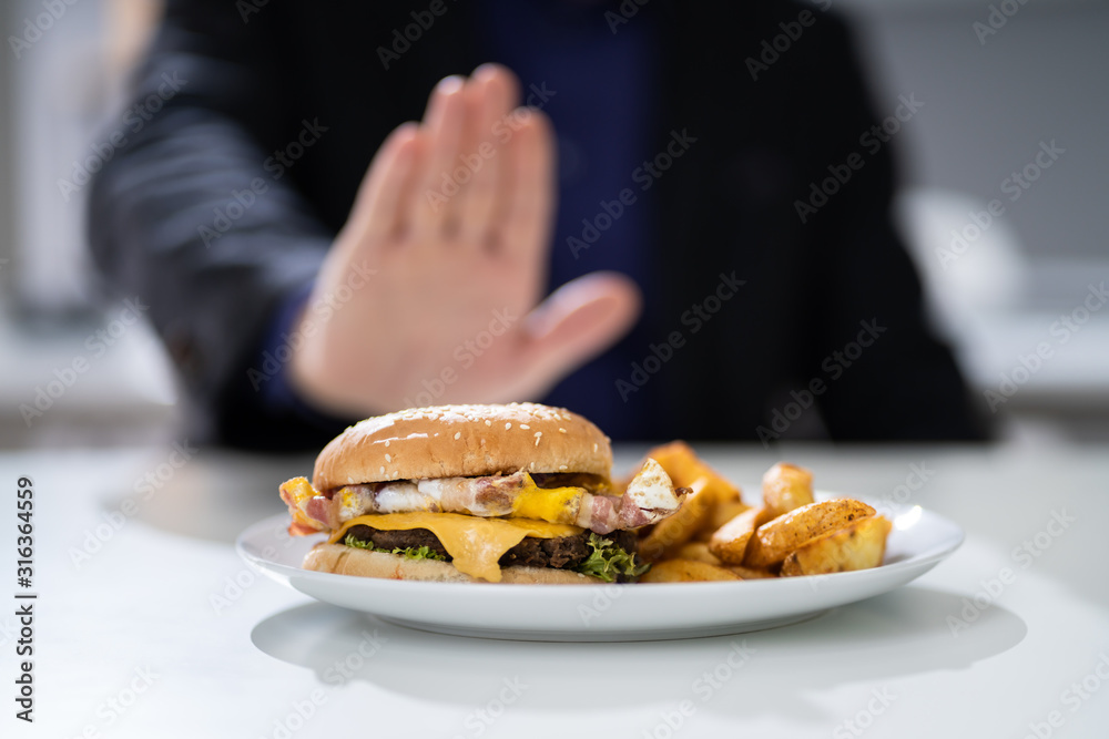 Man Refusing To Eat Burger 스톡 사진 | Adobe Stock