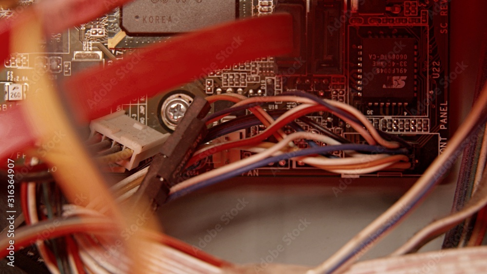 Computer power cables inside PC, macro. the bunch of wires inside of ...