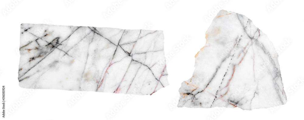Marble pieces cut into different shapes with natural beige colors ...