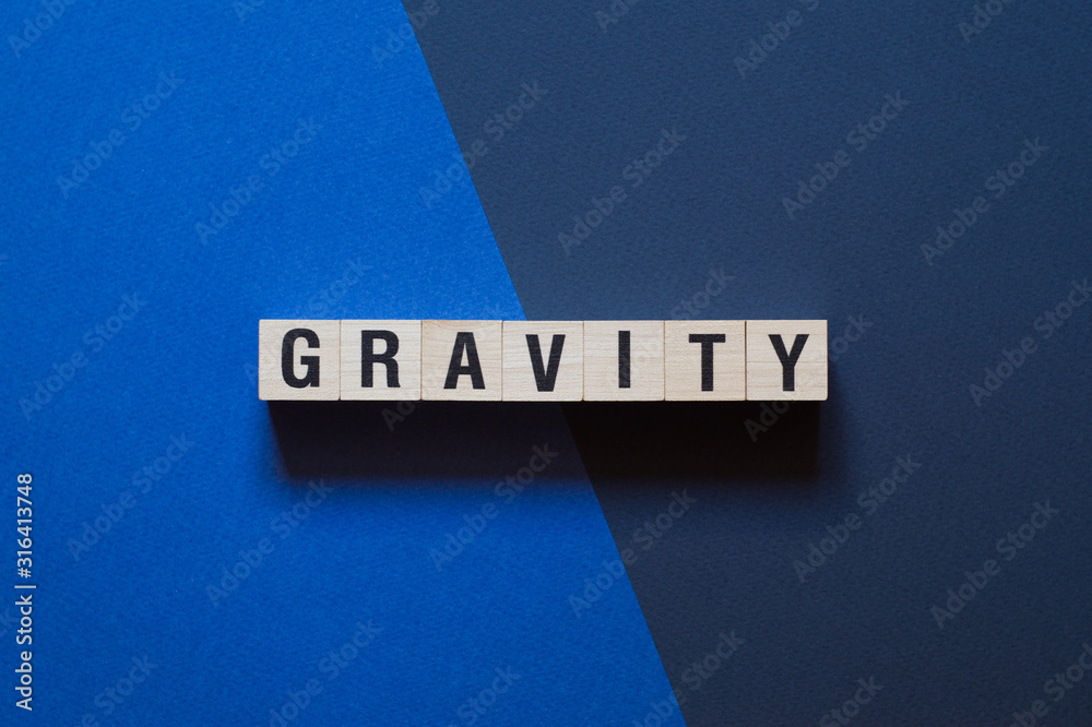 Gravity word concept on cubes Stock Photo | Adobe Stock