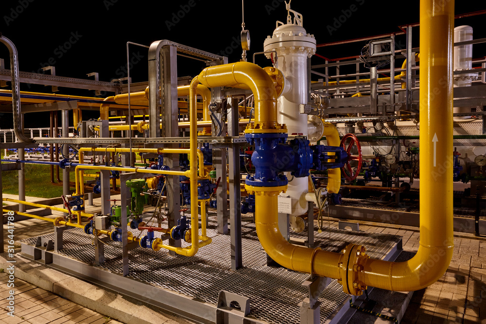 Pipeline system at a gas production and processing plant. Pipes, valves ...