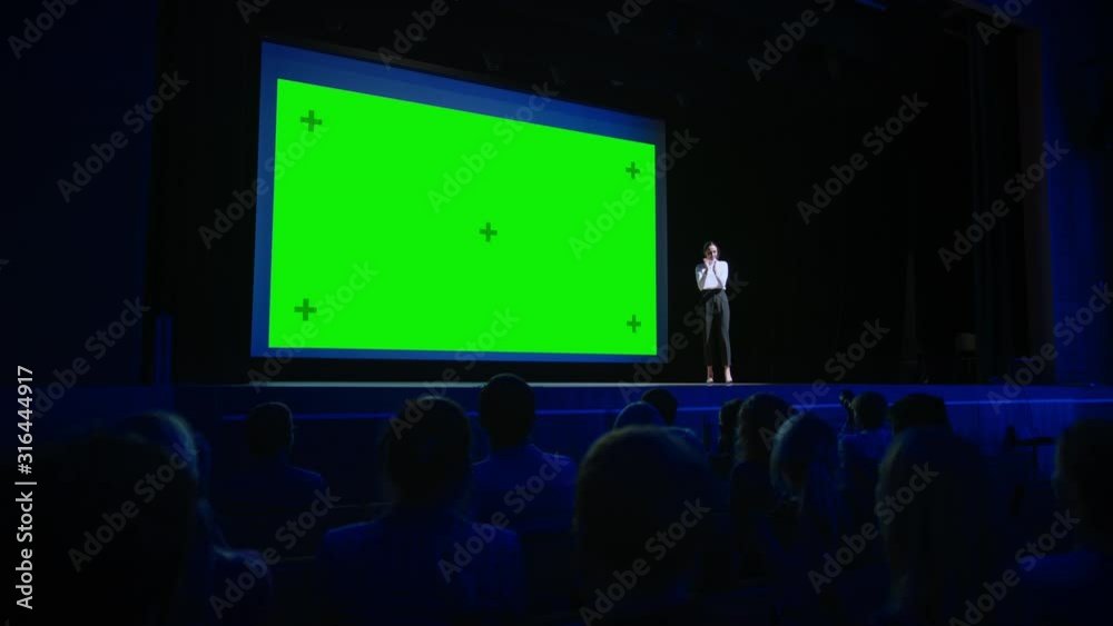 Keynote Speaker Announces New Product to the Applauding Audience ...