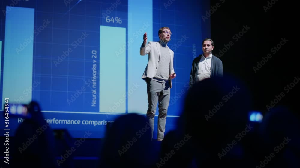 On Stage: Startup CEO and Tech Engineer Present New Product. Speakers ...