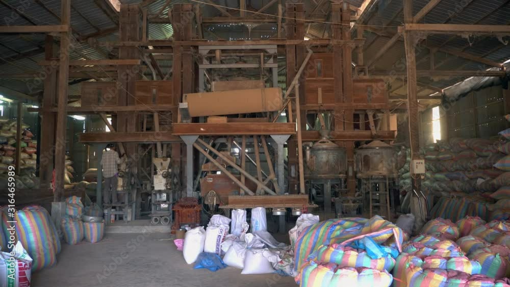 Rice milling system during the different processing steps for produce ...