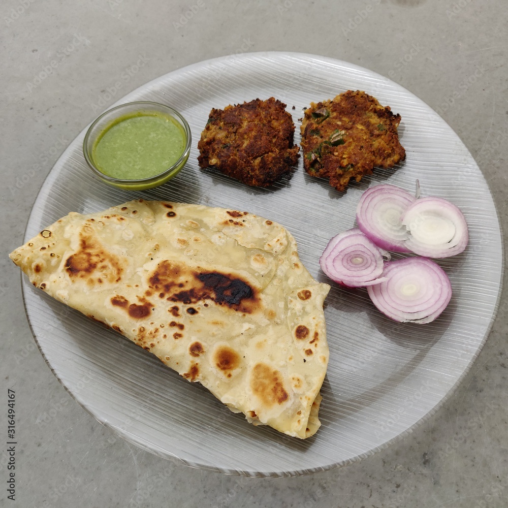 Hydrabadi Kawab Paratha with green chili sauce & Onion on transparent ...