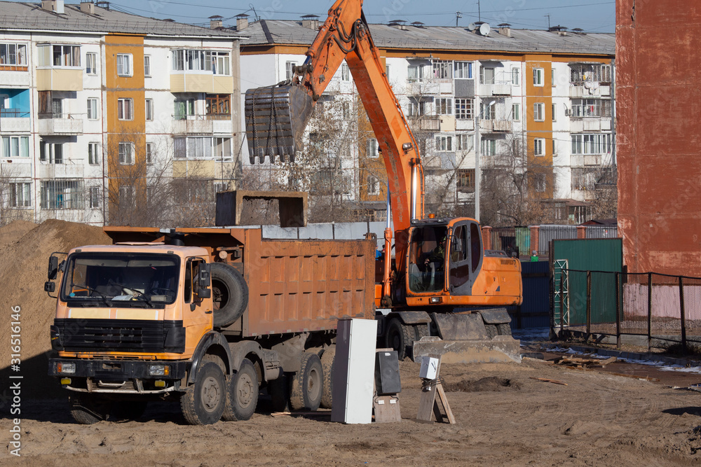 Loading a reinforced concrete block into a truck Stock Photo | Adobe Stock