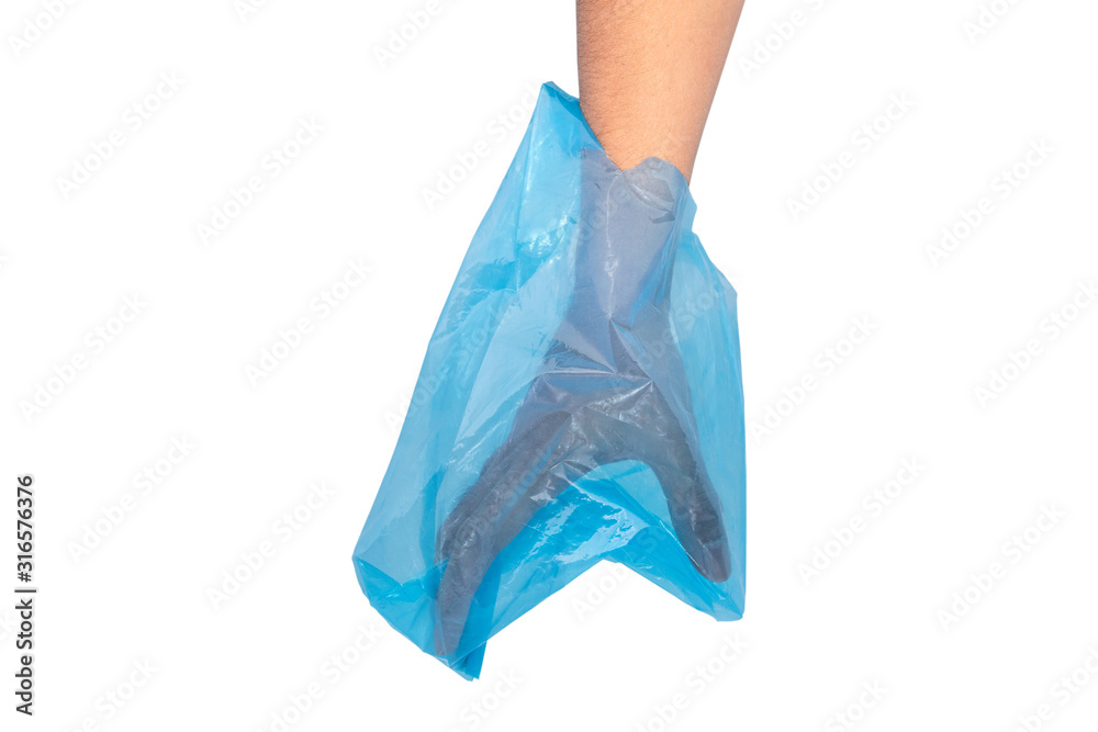Hand try to catch and stuck in blue plastic bag isolated on white ...