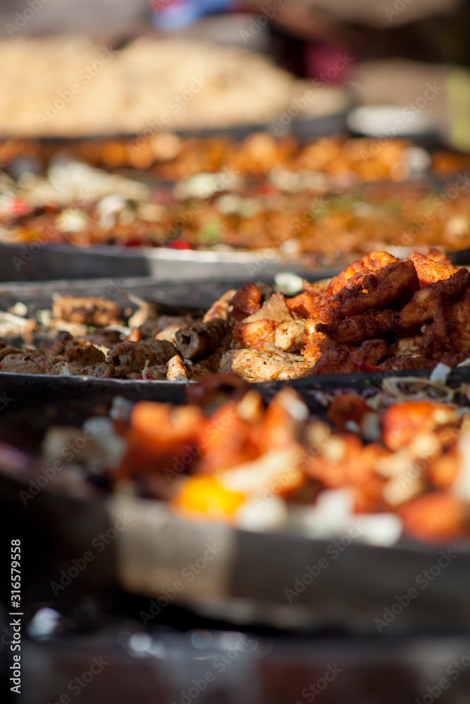 Pakistani cuisine Street food - rice, curry and bread selection. Stock ...