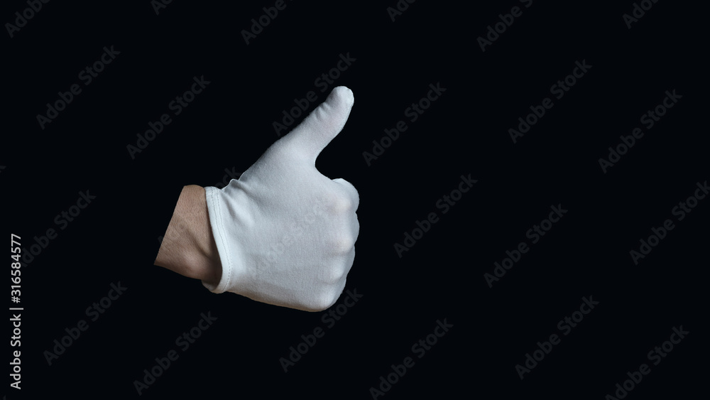 White-gloved hand on a black background. hand in white glove showing ...