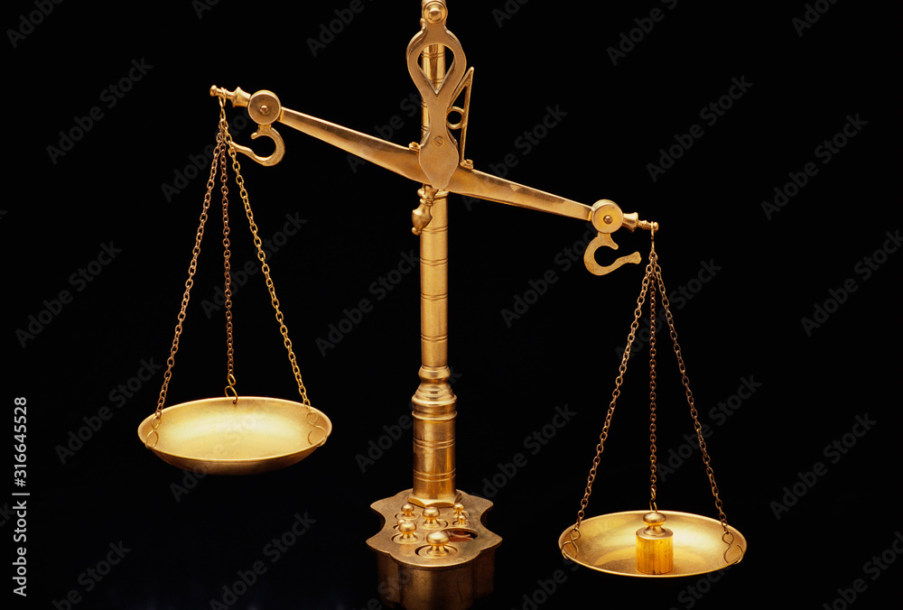 golden Scales of Justice. They represent the legal system and courts ...