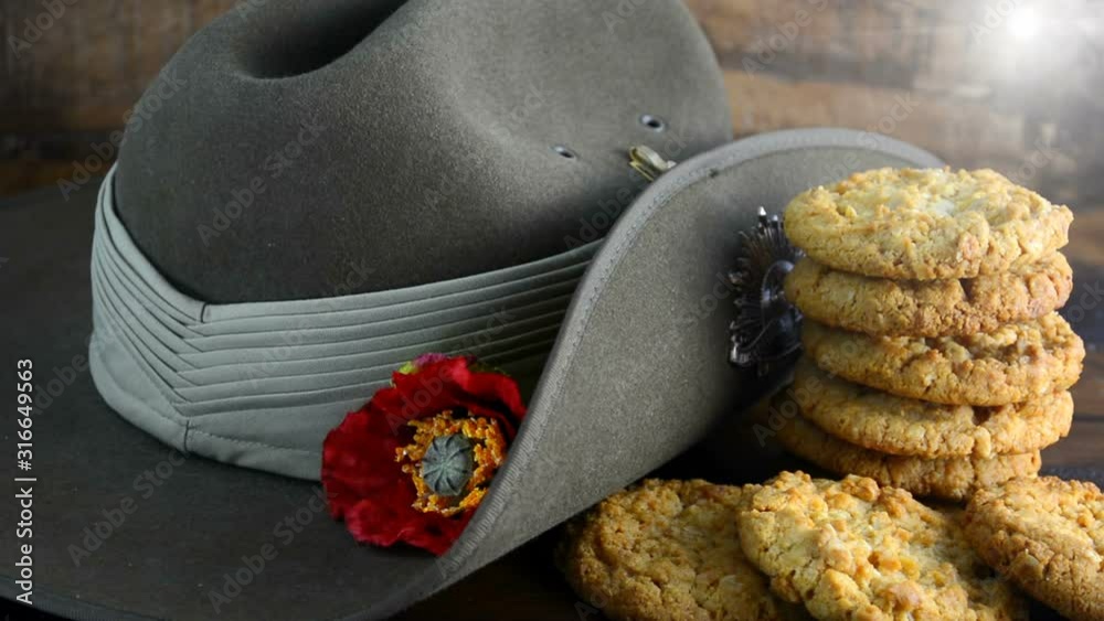 Australian Anzac biscuits with soldier slouch hat on dark vintage ...