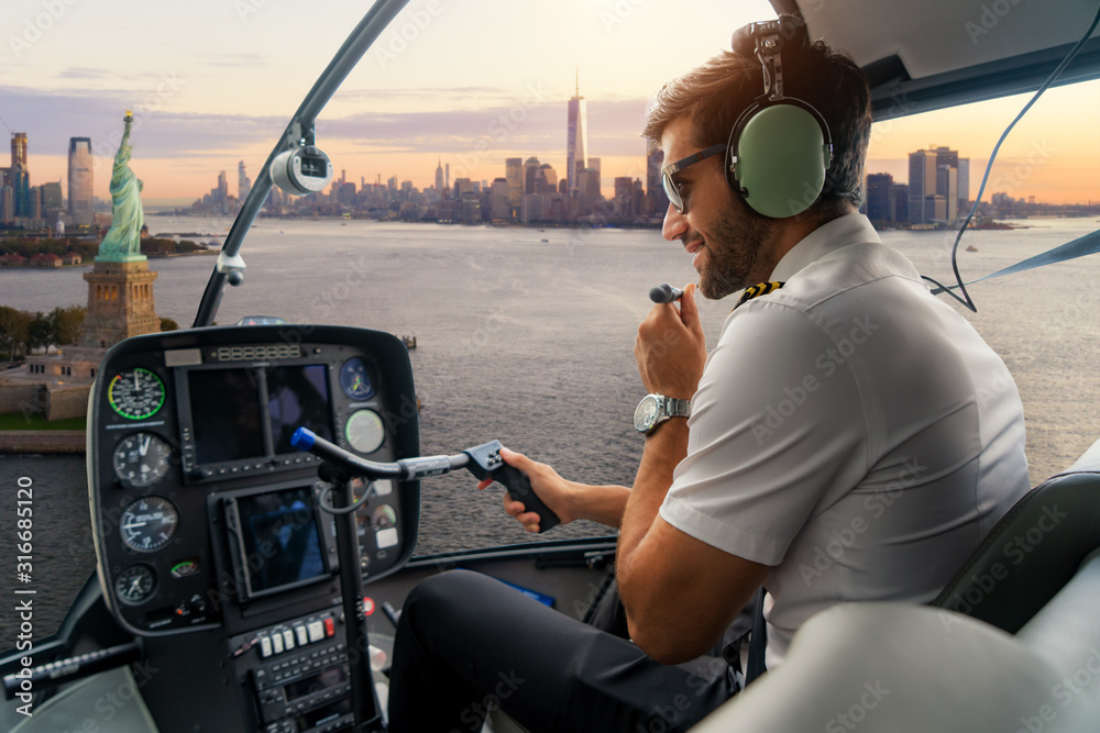 Helicopter cockpit with pilot arm and control console inside the cabin ...