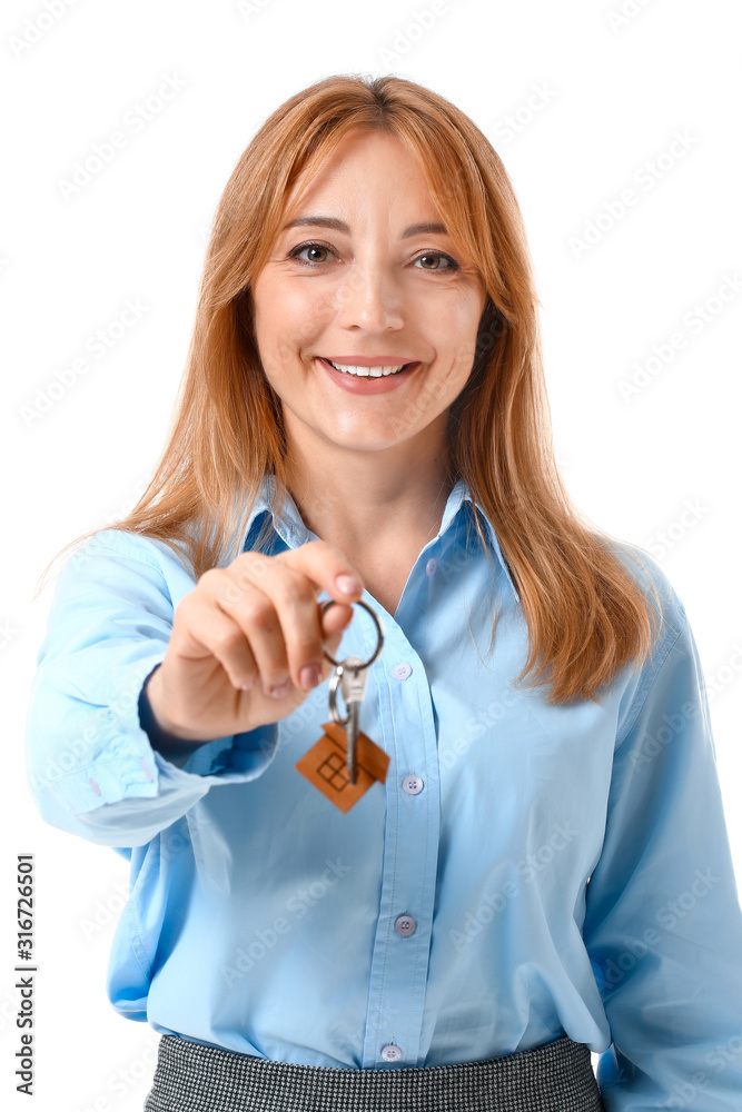 Female real estate agent with key on white background Stock Photo ...