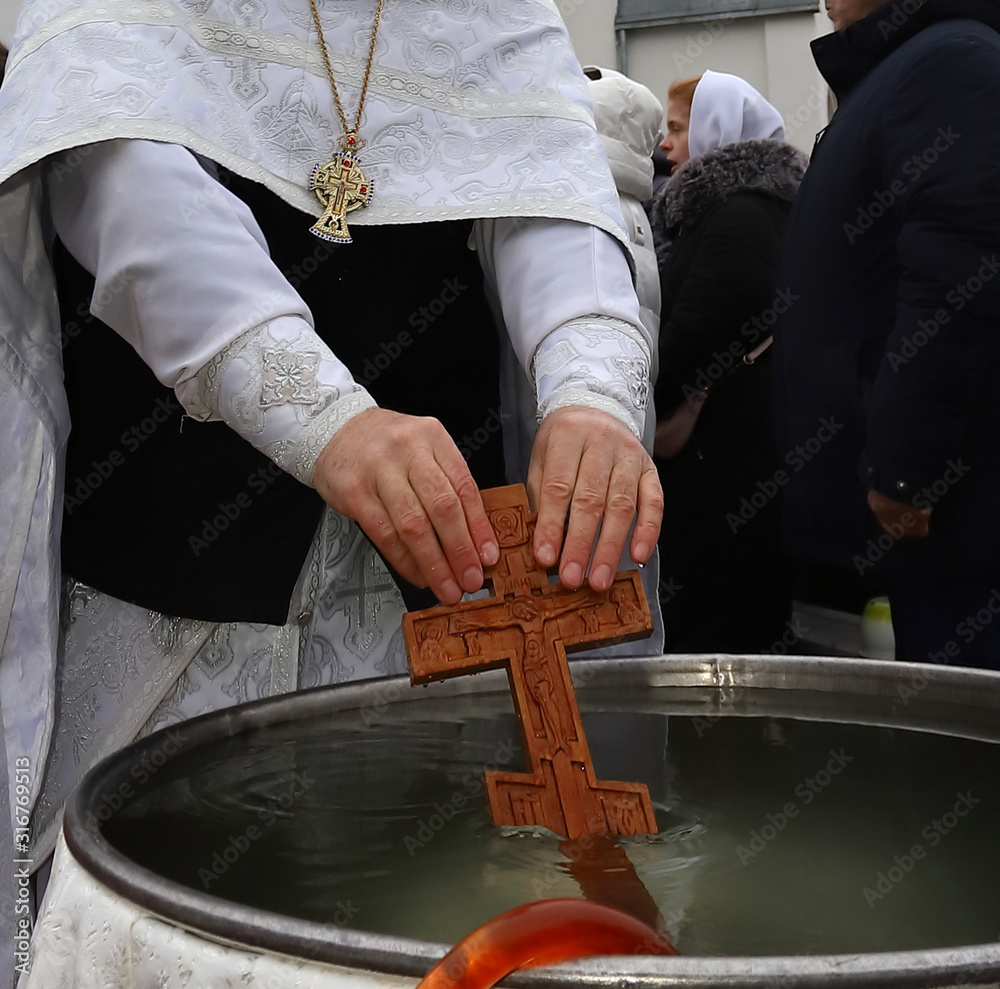Orthodox Vira, Baptism and Jordan sanctified water. Orthodox priest ...