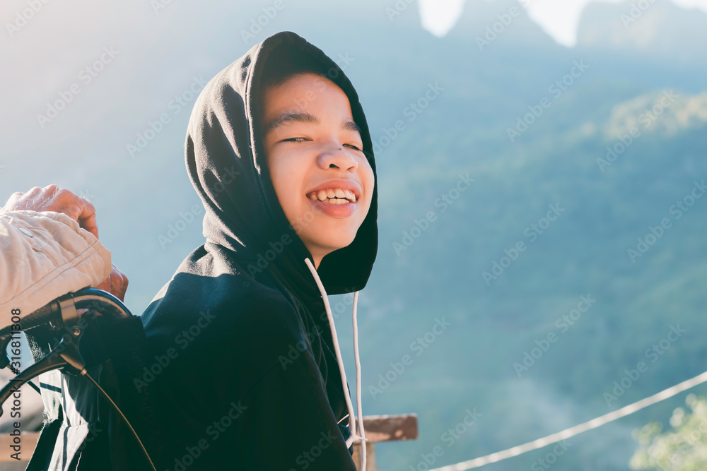 Portrait of Disabled child on wheelchair and father's hand, Mountain ...