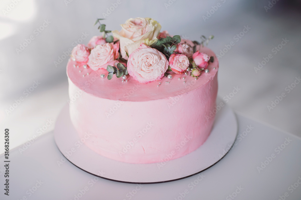 Beautiful delicious pink cake with roses Stock Photo | Adobe Stock