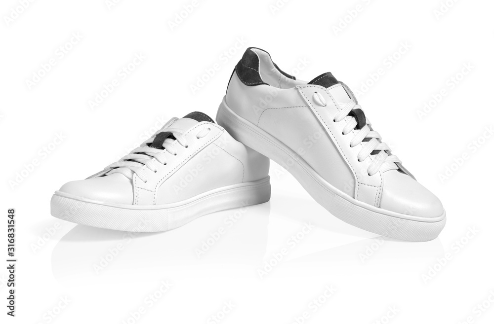 White sneakers isolated on white background Stock Photo | Adobe Stock