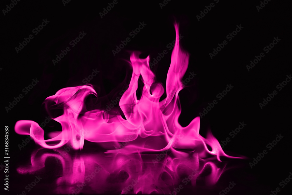 Beautiful fire pink flames on a black background. Stock Photo | Adobe Stock