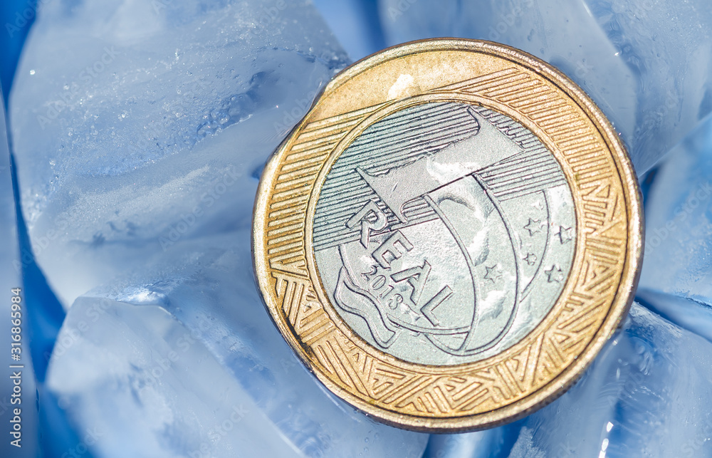 Brazilian coin, Real. Illustration of the devaluation of the Brazilian ...